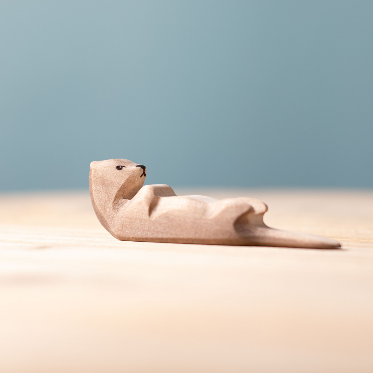 Sleeping Otter Wooden Figure - Hand-Carved & Natural | Bumbutoys