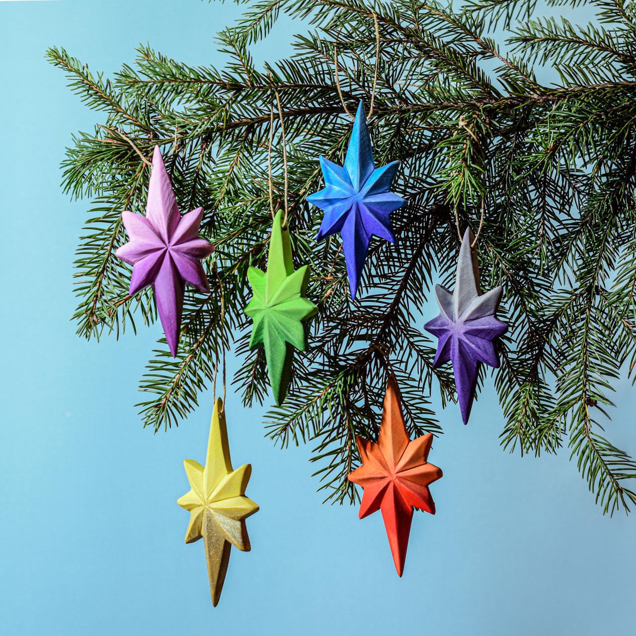 Colorful Wooden Star Ornaments - Handcrafted Holiday Decor by BumbuToys